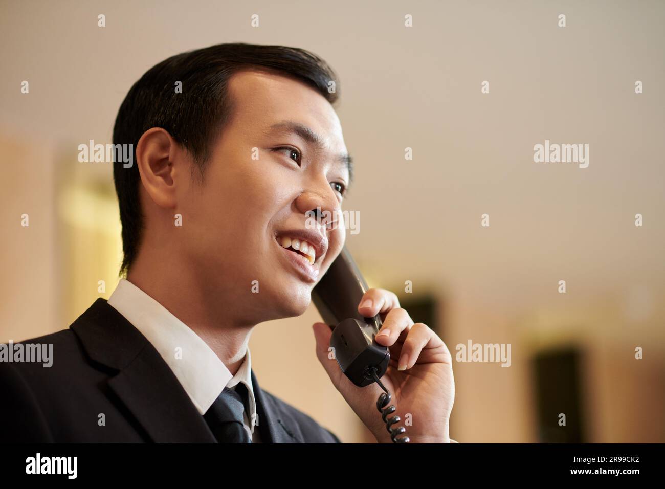 Resort staff talking hi-res stock photography and images - Alamy
