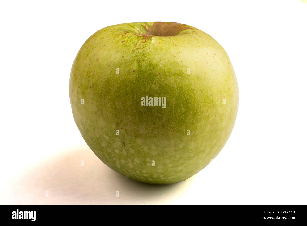 green apple with fading from above, isolated on white background Stock ...