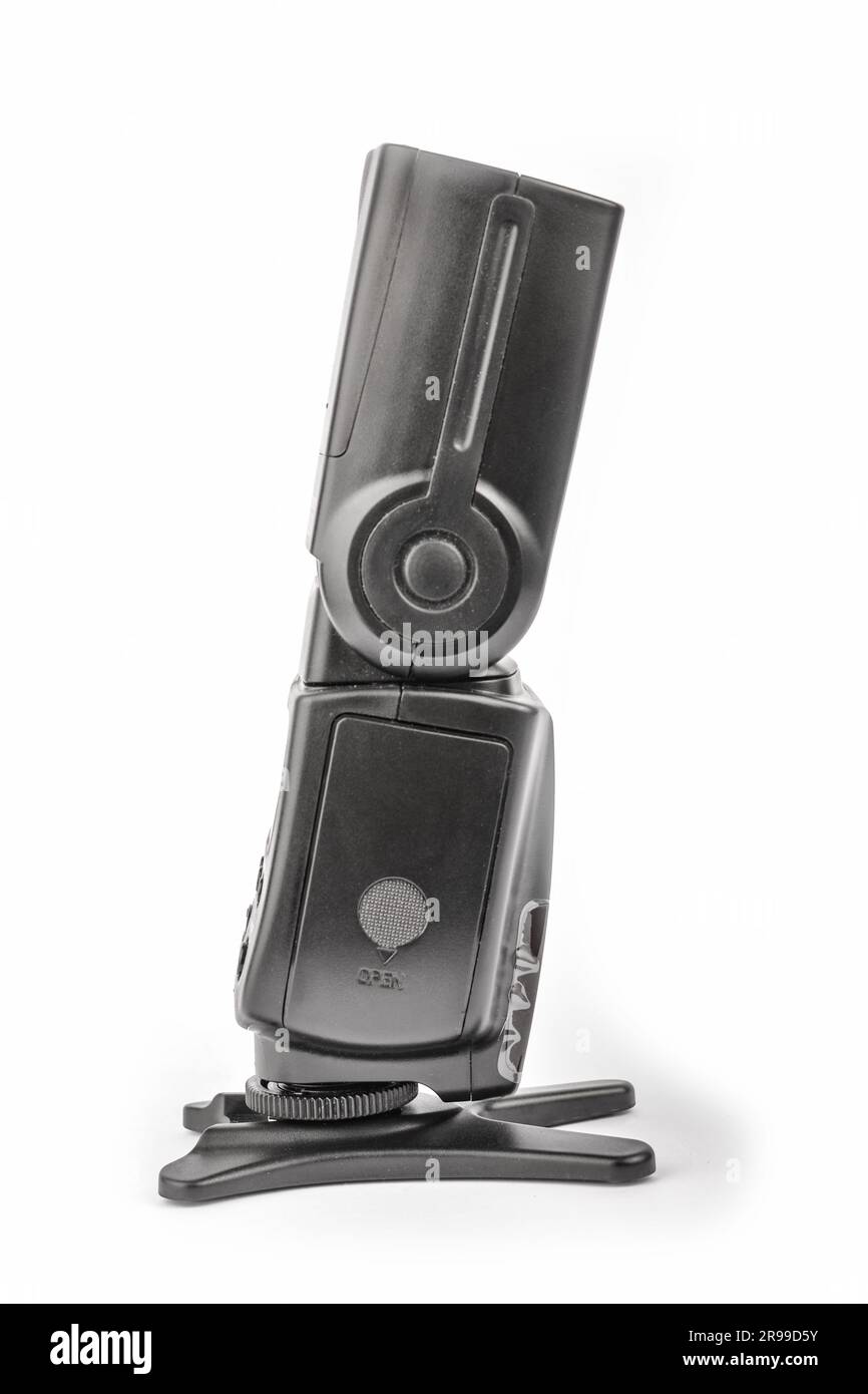 Black camera flash on the stand isolate Stock Photo - Alamy