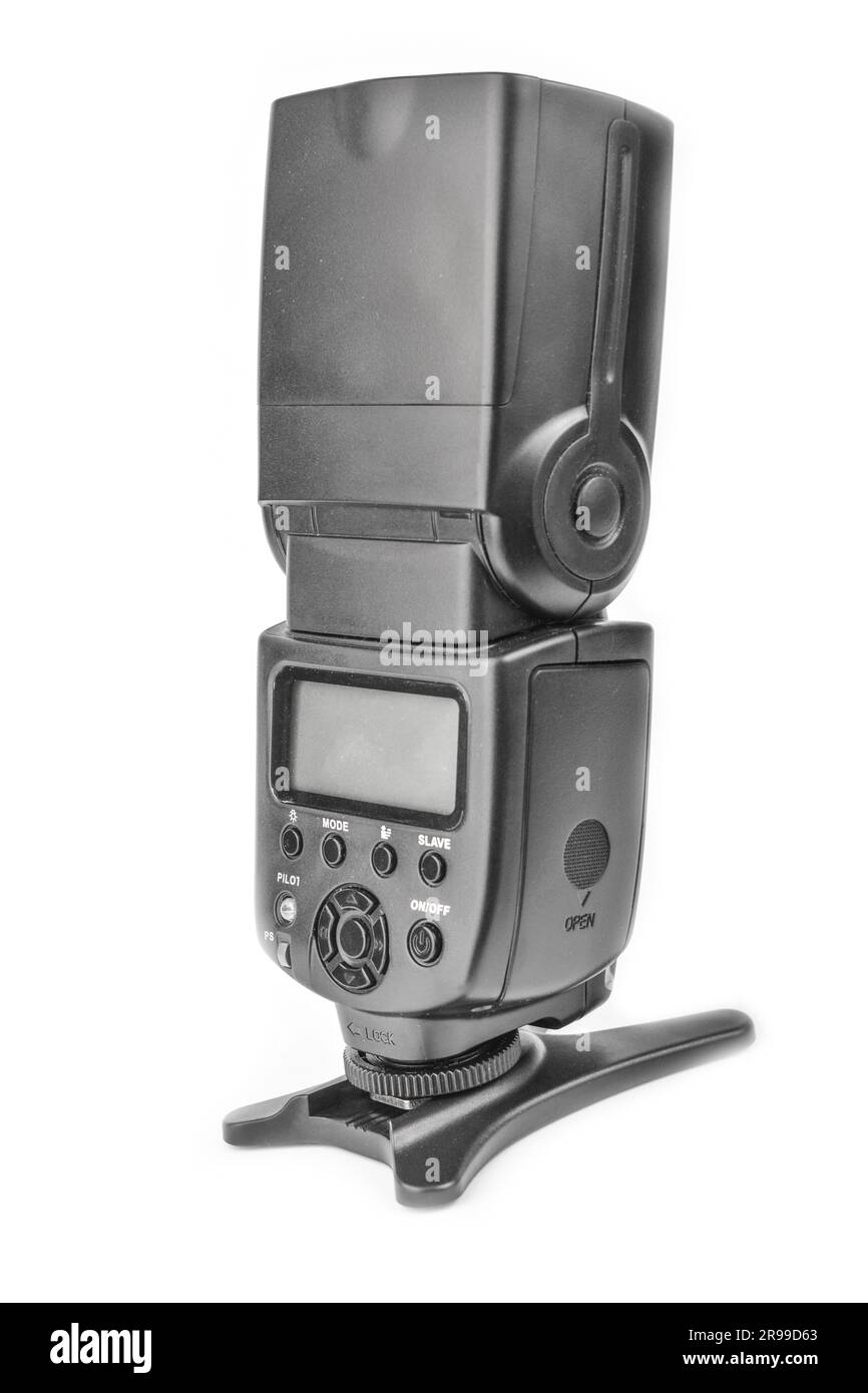 Black camera flash on the stand isolate Stock Photo - Alamy