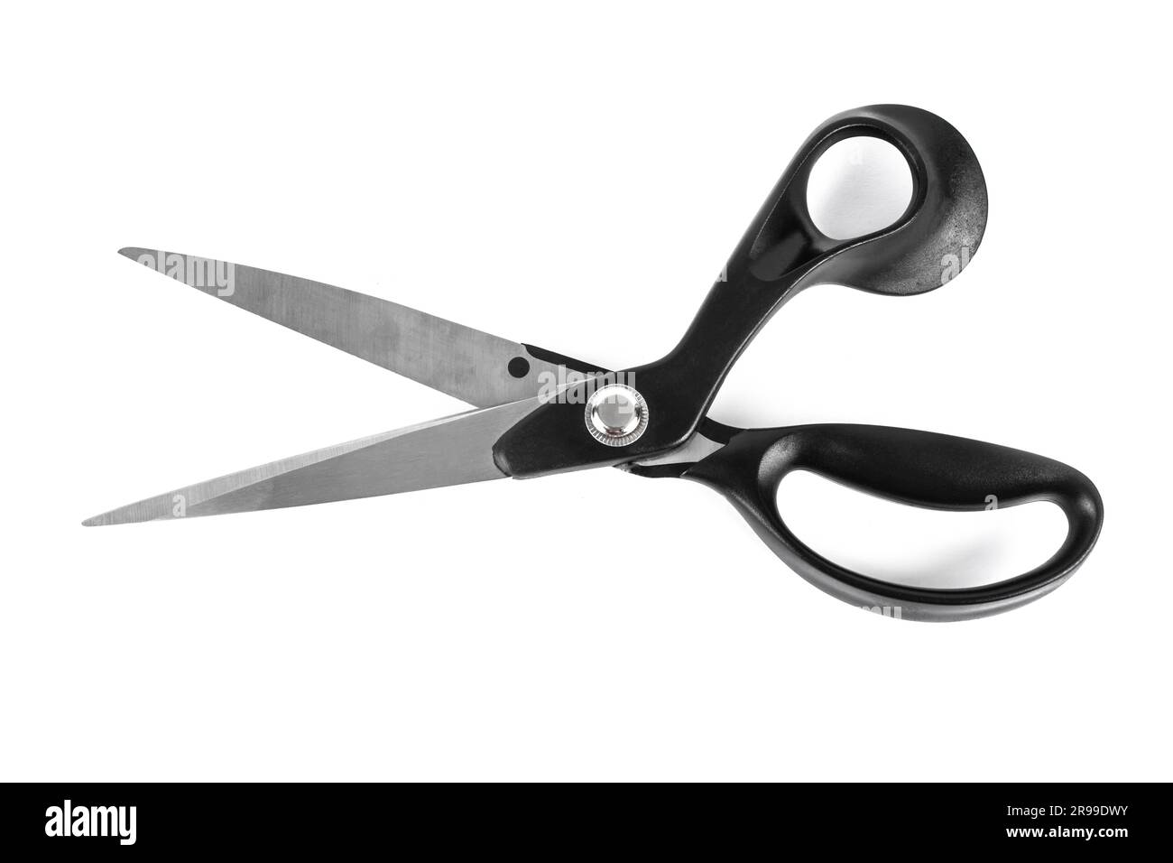Pair of tailor scissors with black handle isolated on white background ...