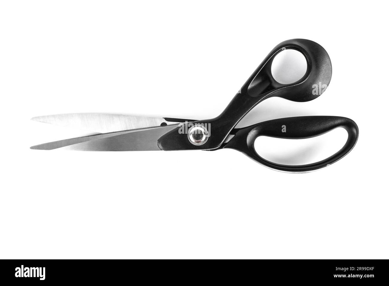 Pair of tailor scissors with black handle isolated on white background ...
