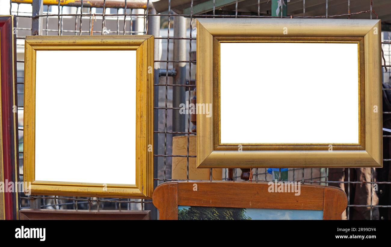 Empty space rectangular golden picture frames outside Stock Photo - Alamy
