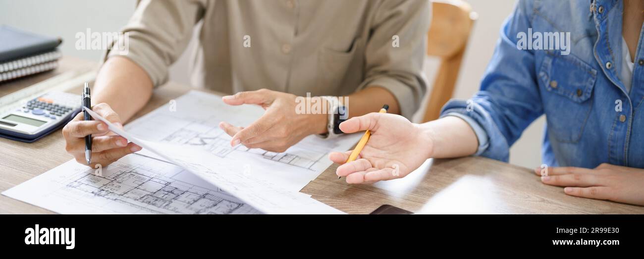 Concept of engineering consulting, Two female engineers discussing ...