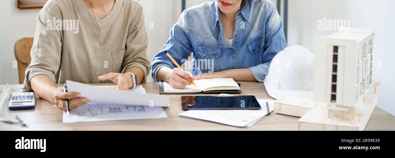 Engineering construction concept, Two female engineers is discussing ...