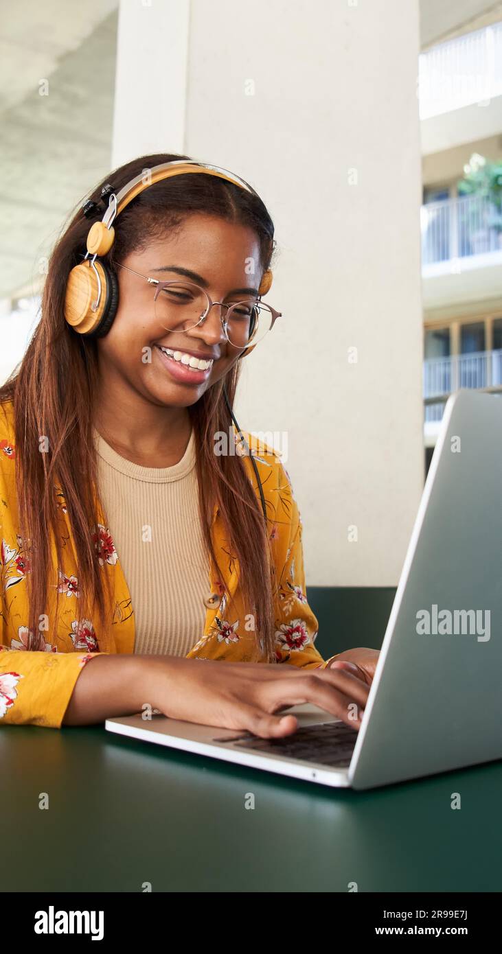 Young black African woman university student learning online using ...