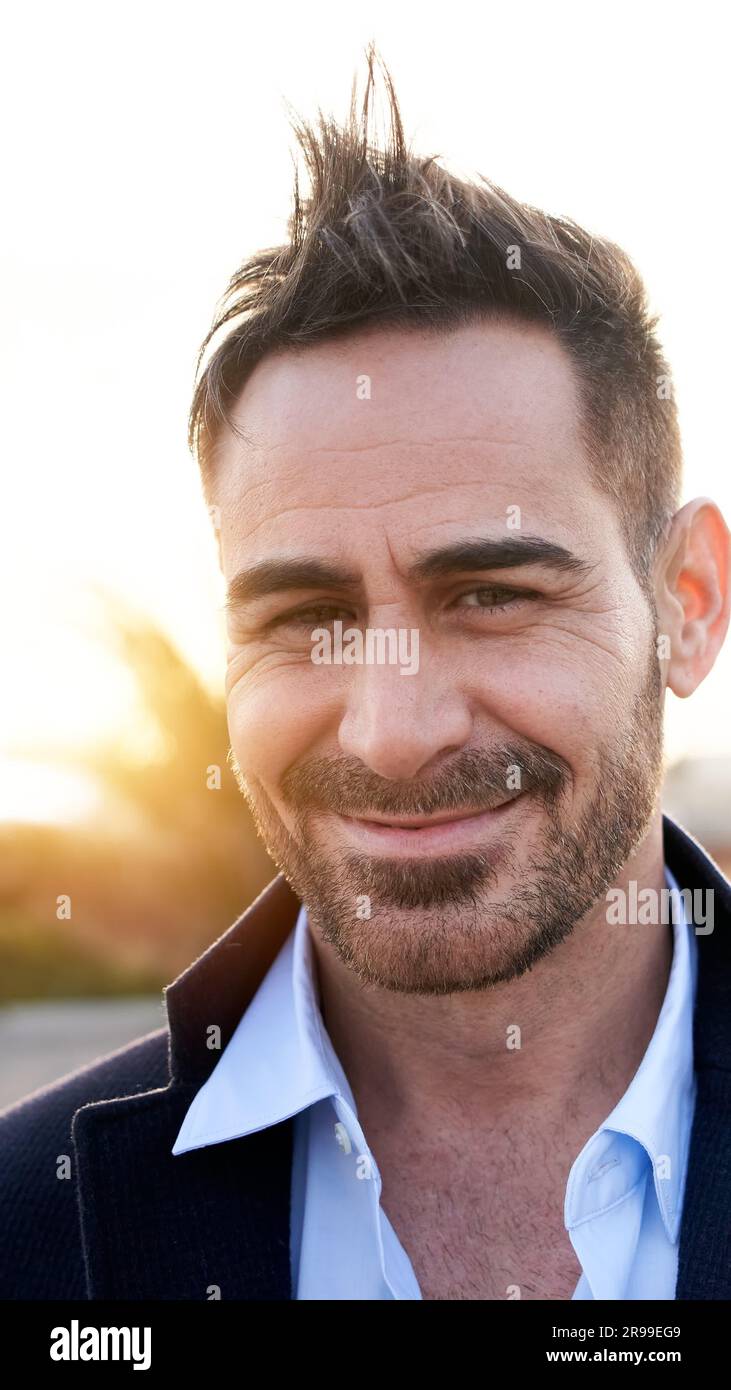 Cheerful attractive spanish man hi-res stock photography and images - Alamy