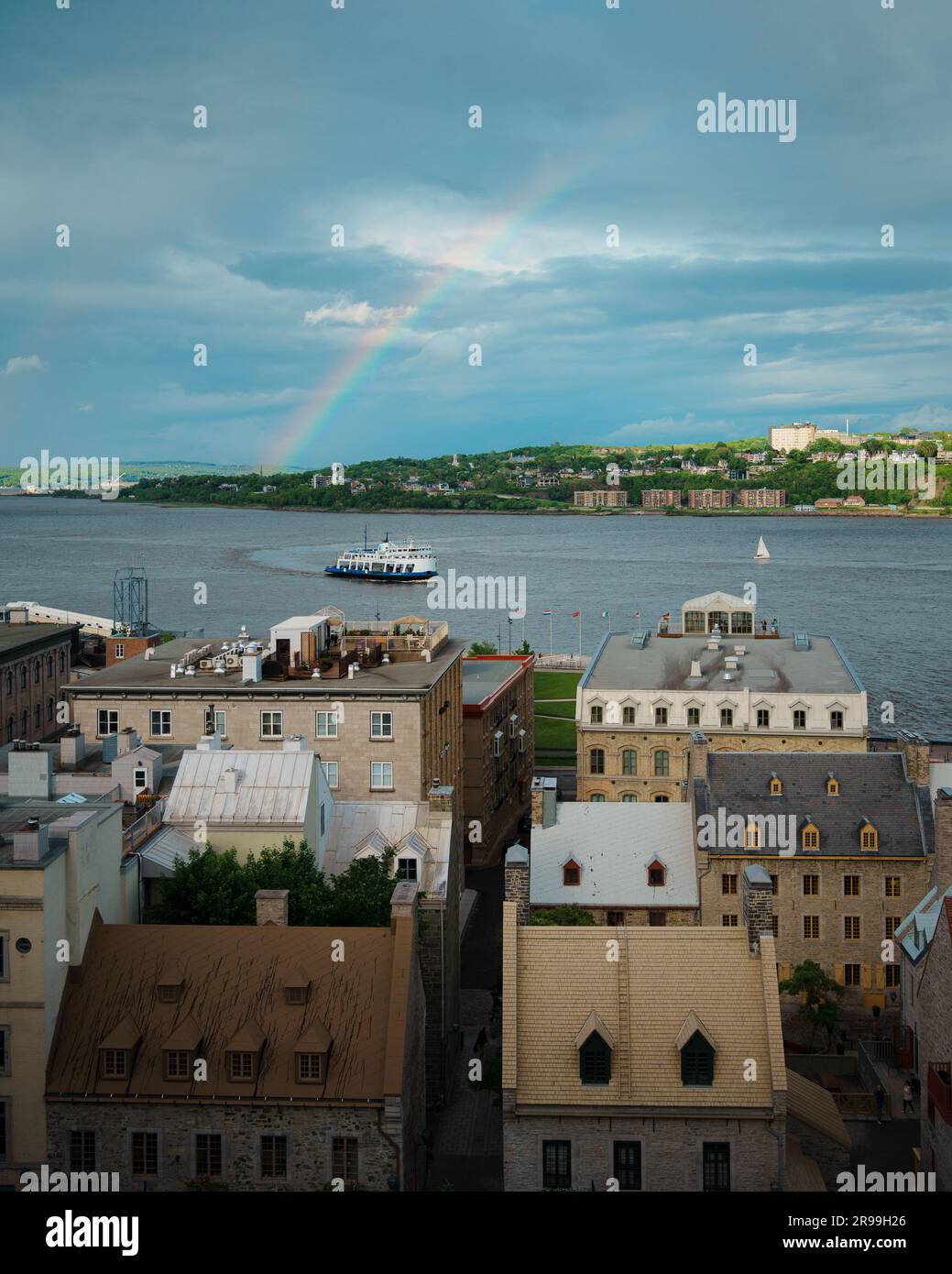 View of a rainbow over the St. Lawrence River, in Québec City, Quebec ...