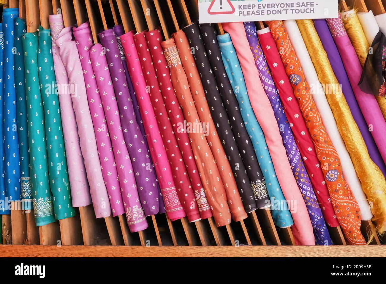 Different colours and patterned Indian saree dress textiles Stock Photo ...