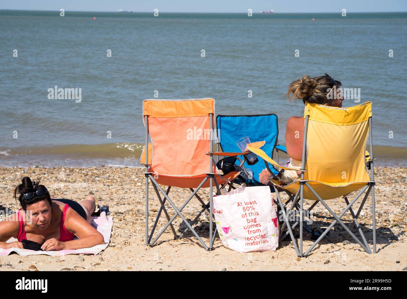 Kent, 25th June 2023. UK Weather. beach goers sunbathing . Jet skiing ...