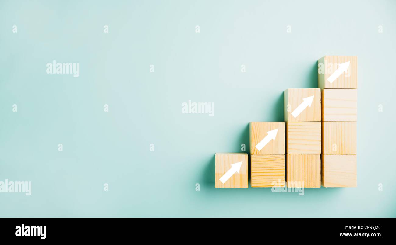 Wooden block stacking as a ladder career path concept Stock Photo - Alamy