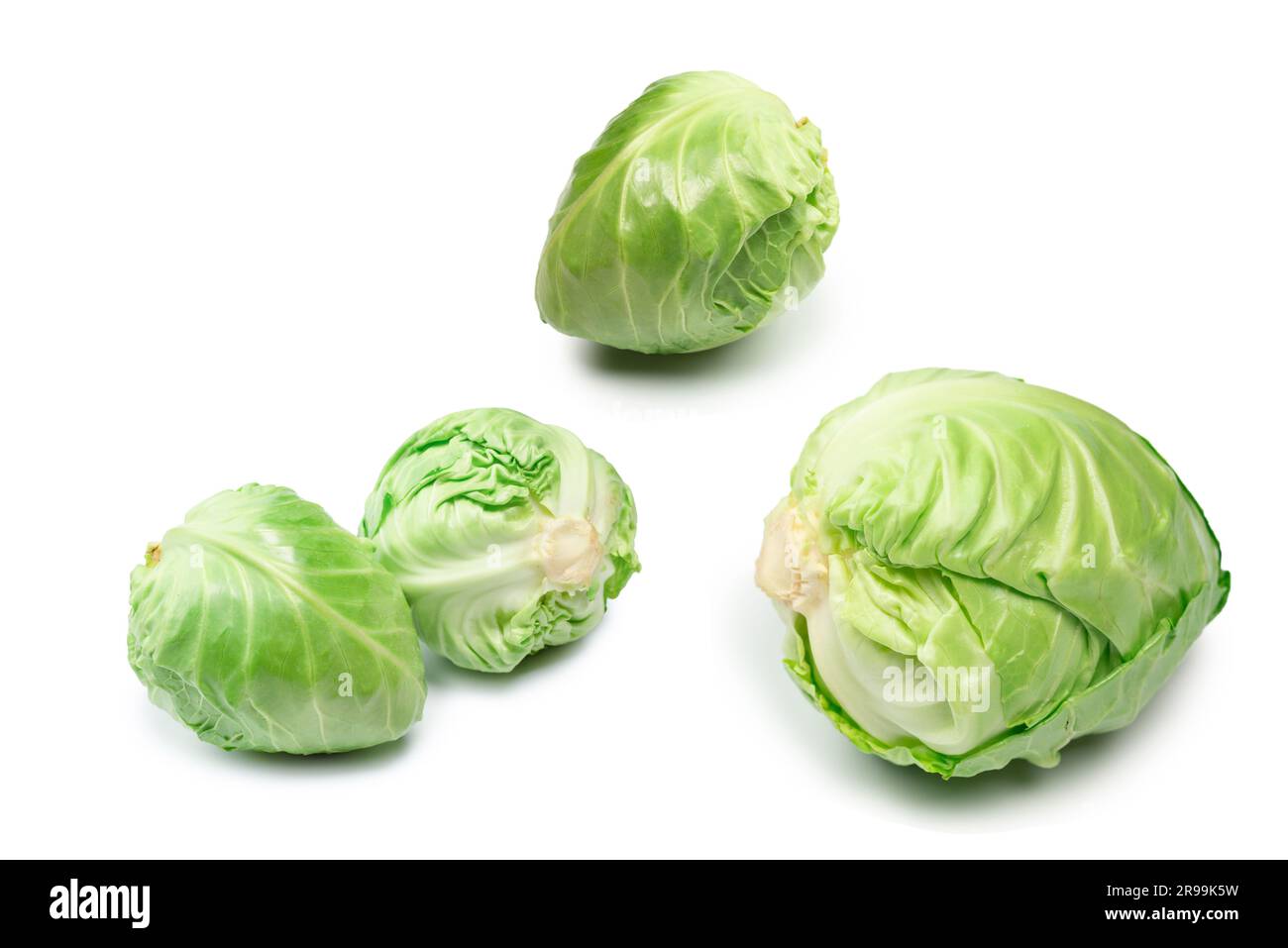 Fresh green cabbage isolated on a white background Stock Photo - Alamy