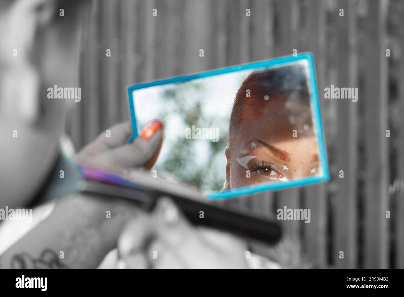 Selective color of reflection in the mirror during face makeup Stock ...