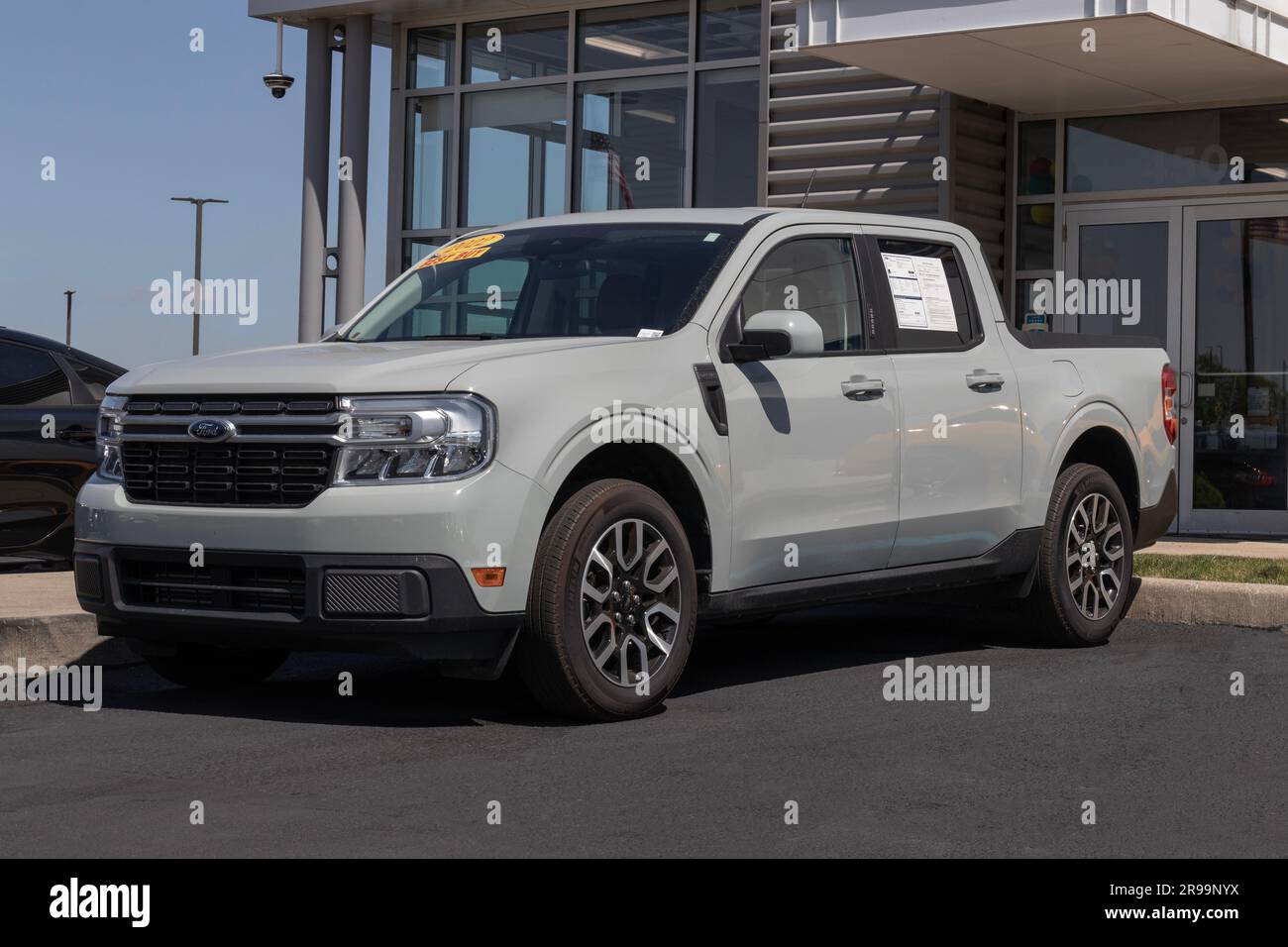 Brownsburg - June 24, 2023: Ford Maverick compact truck display at a ...