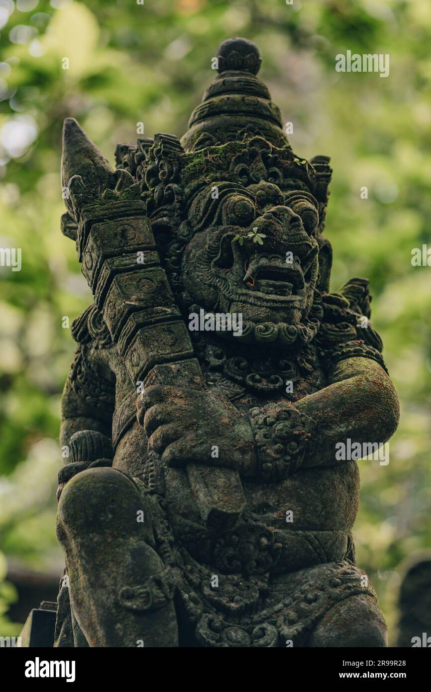 Stone sculpture in sacred monkey forest. Balinese architecture carved ...
