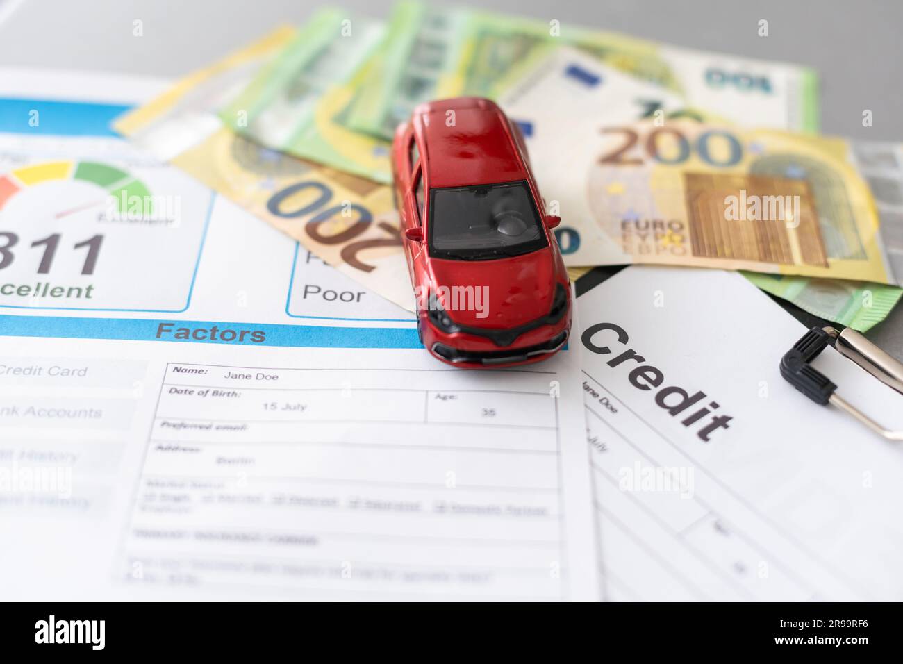 Fair credit score report with pen and keyboard; document is mock-up ...