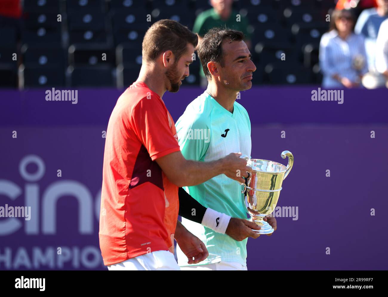 Ivan Dodig and Austin Krajicek with the trophy following the men's ...