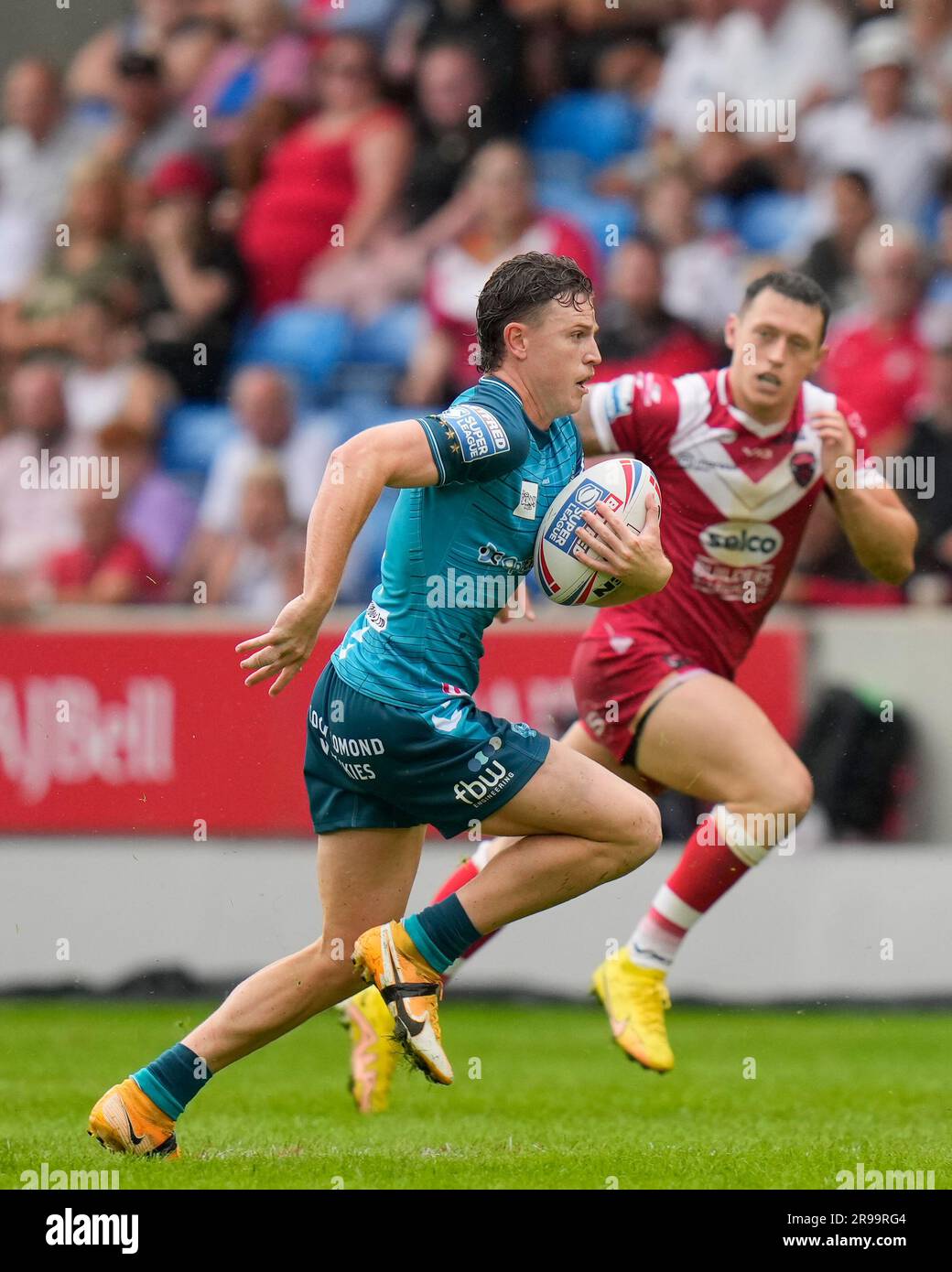 Jai Field #1 of Wigan Warriors makes a break during the Betfred Super ...