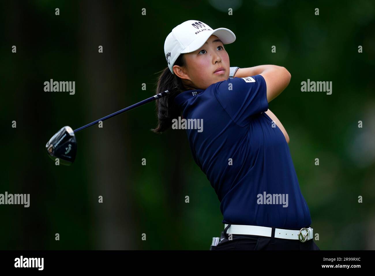 Ruoning Yin, of China, tees off on the third hole during the final ...