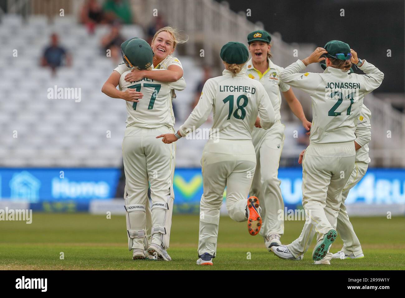 Kim Garth of Australia celebrates the dismissal of Sophia Dunkley of ...