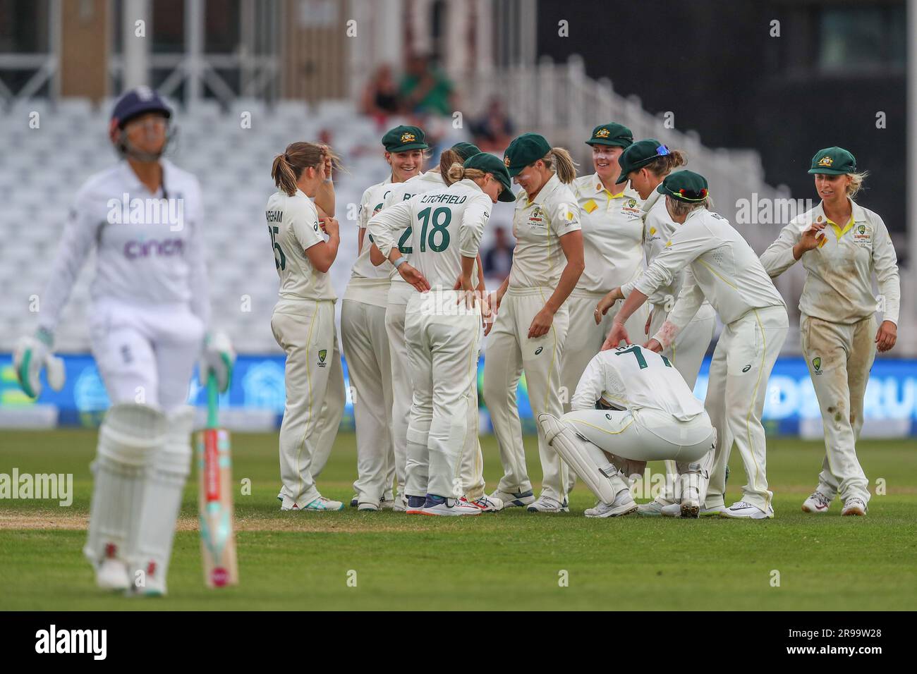 Kim Garth of Australia celebrates the dismissal of Sophia Dunkley of ...