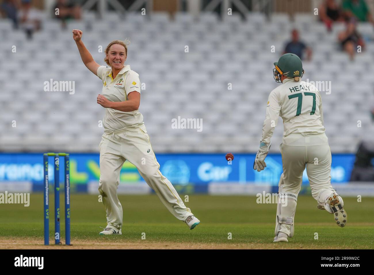 Kim Garth of Australia celebrates the dismissal of Sophia Dunkley of ...