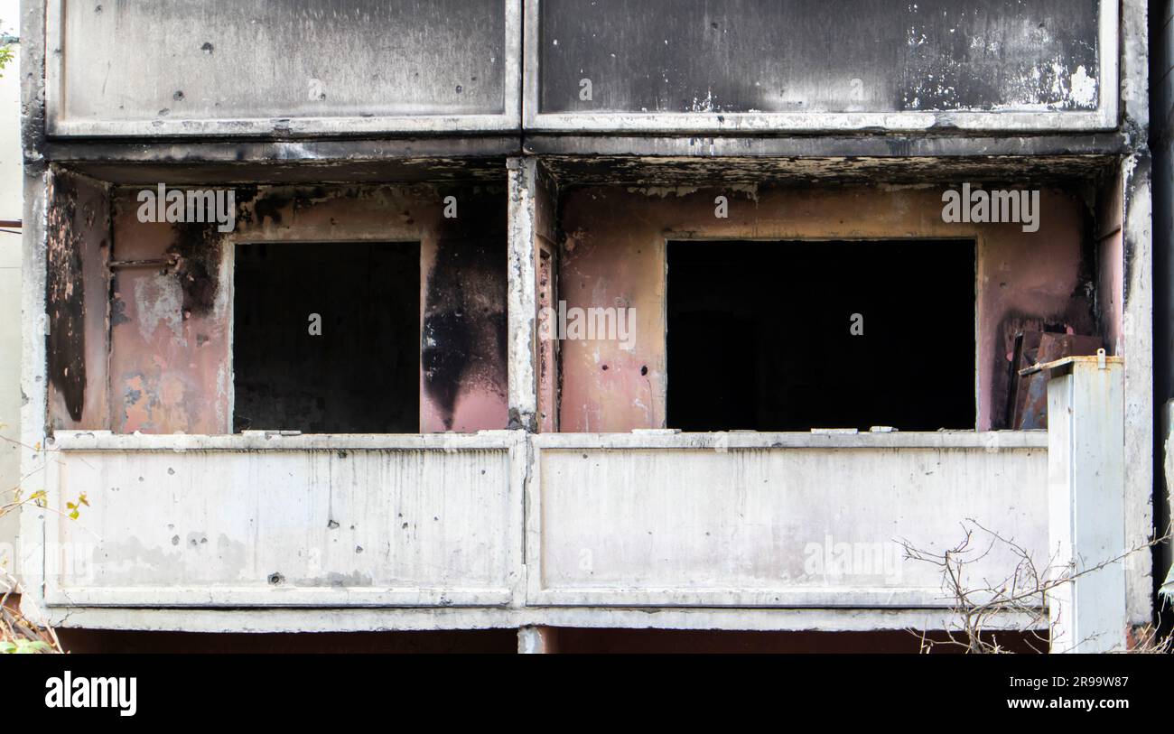 Russian invasion of Ukraine. A destroyed building in the city after a ...