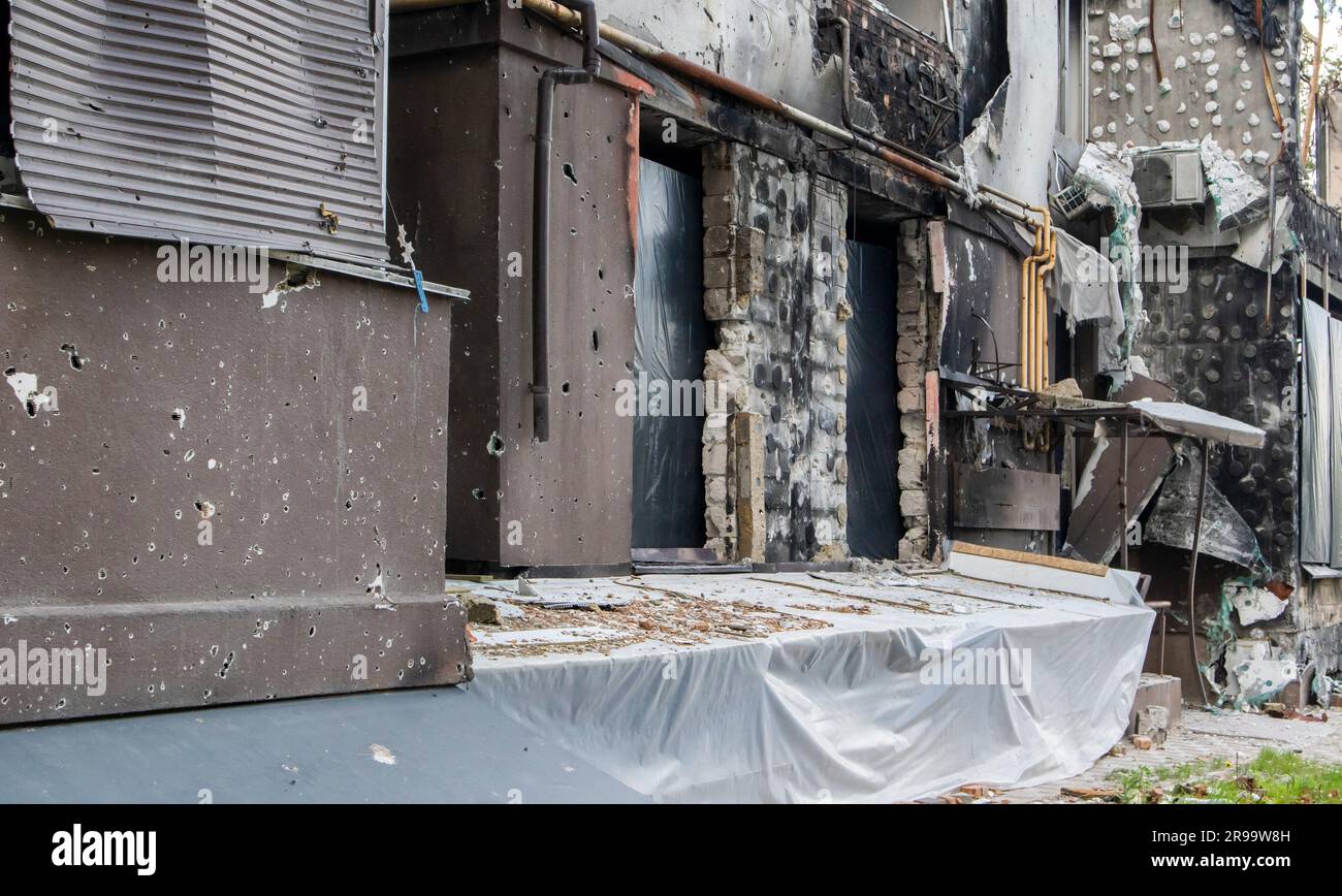 Residential buildings, windows and balconies were damaged by the blast ...