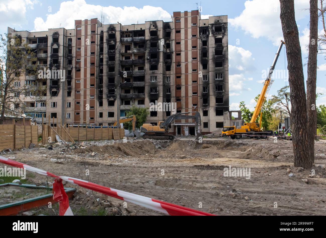 Construction work on the demolition of multi-storey apartments. Fence ...