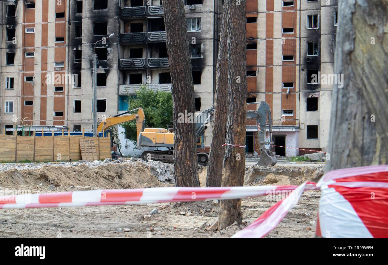 Construction work on the demolition of multi-storey apartments. Fence ...