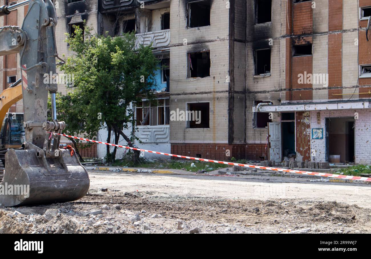 Construction work on the demolition of multi-storey apartments. Fence ...