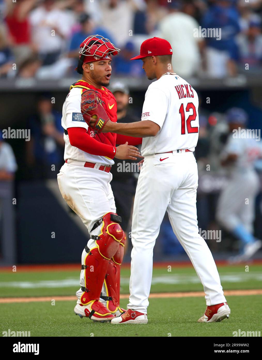 St. Louis Cardinals' Jordan Hicks (right) and Willson Contreras ...
