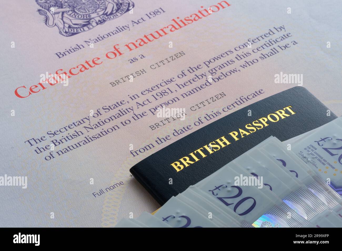 British passport, pile of cash and Certificate of naturalisation as a ...
