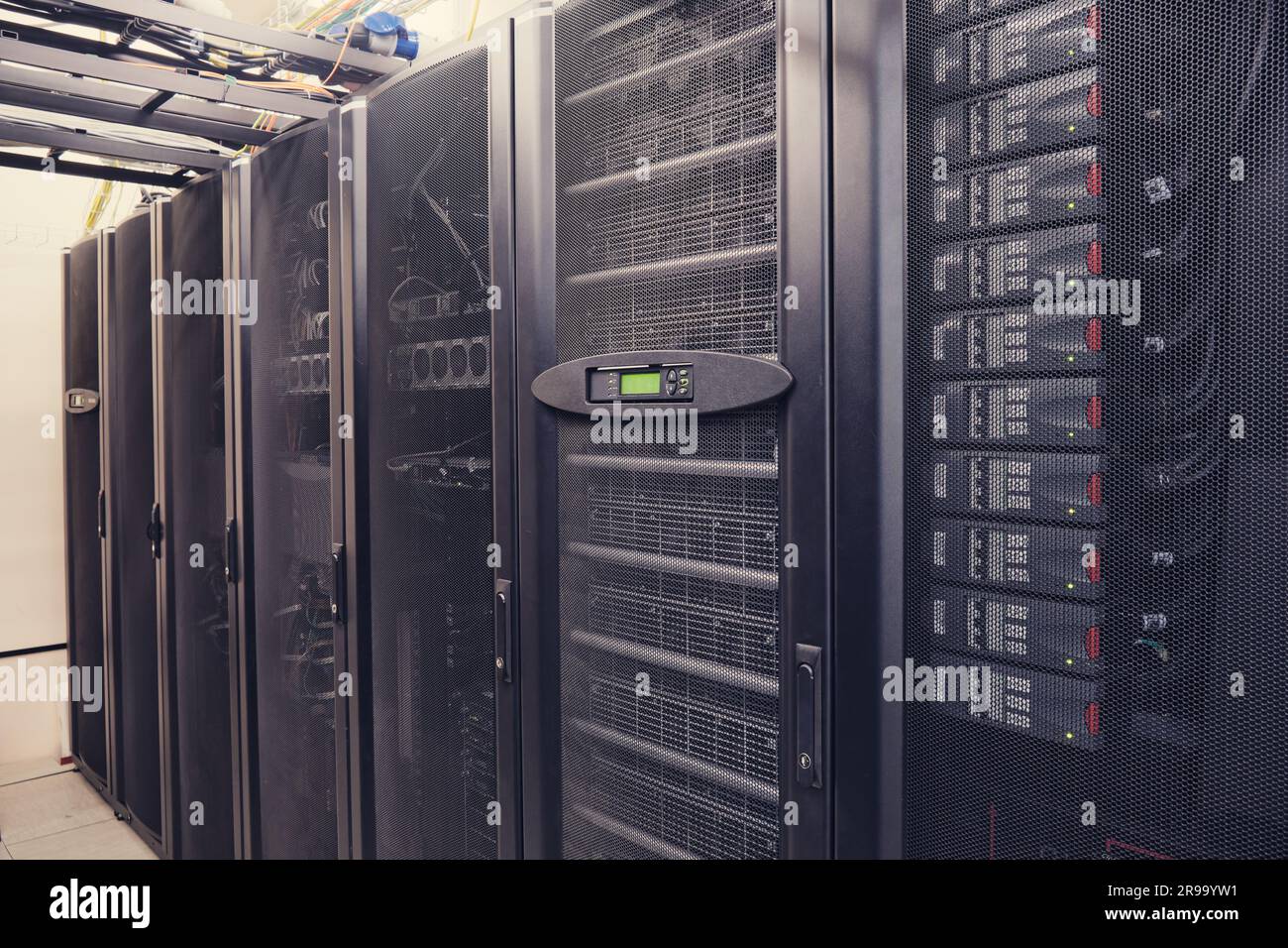 In the server room, the UPS battery is connected to an emergency power ...