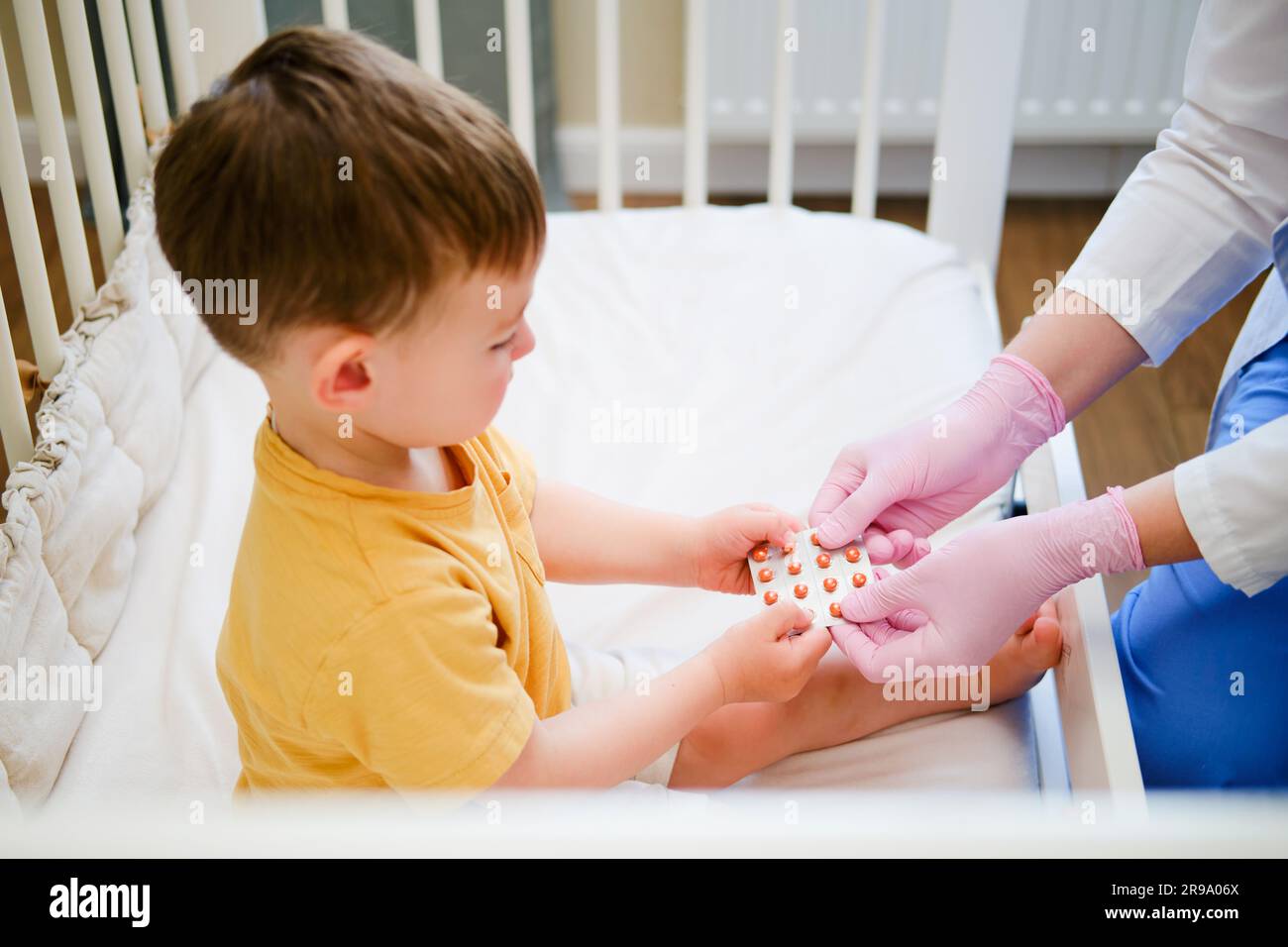 The pediatric specialist examined the child and prescribed a suitable ...
