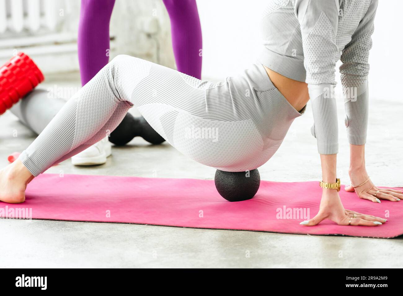 Slim woman training with yoga coach. Private lessons with personal ...