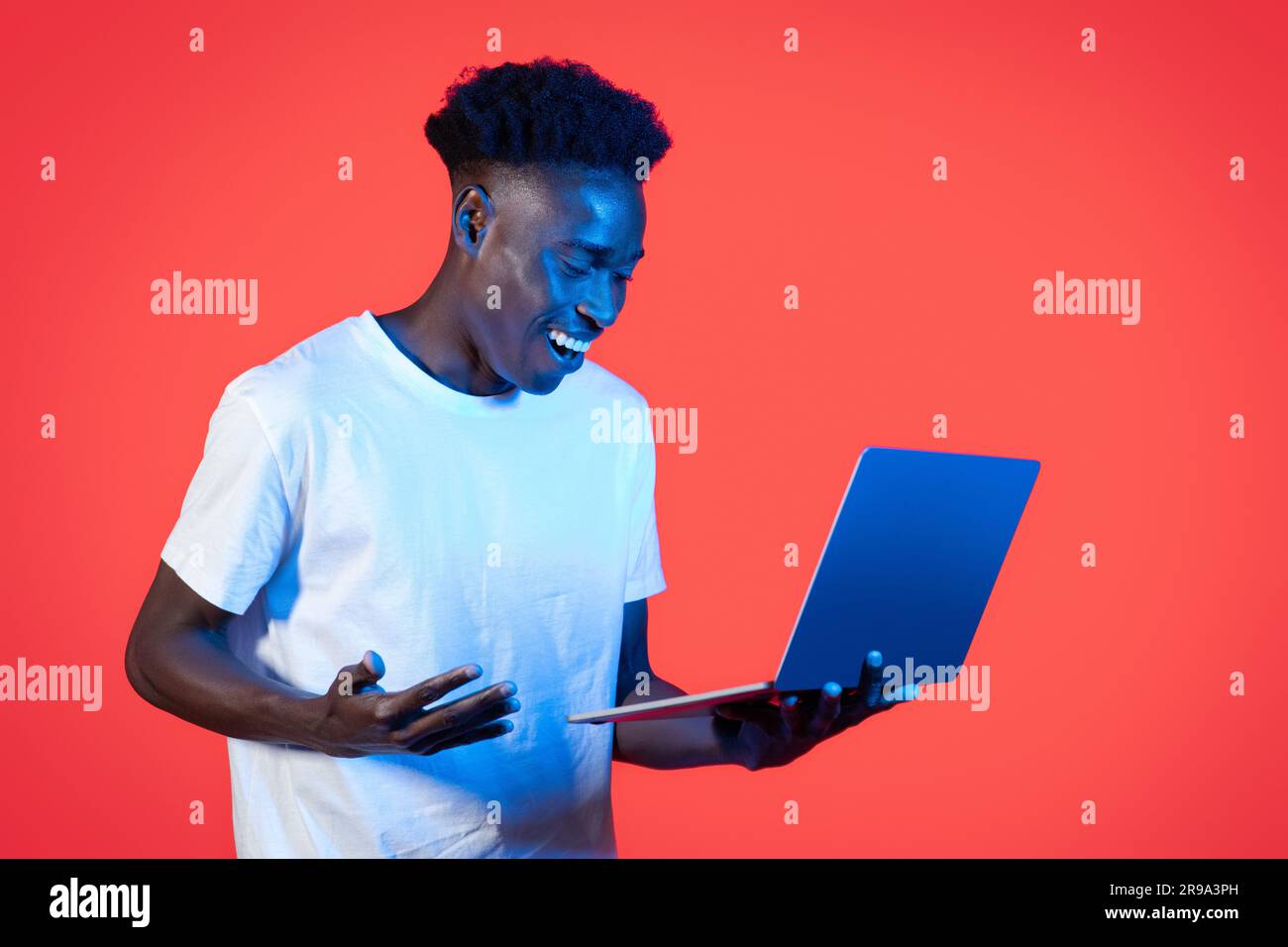 Happy modern black african man hi-res stock photography and images - Alamy