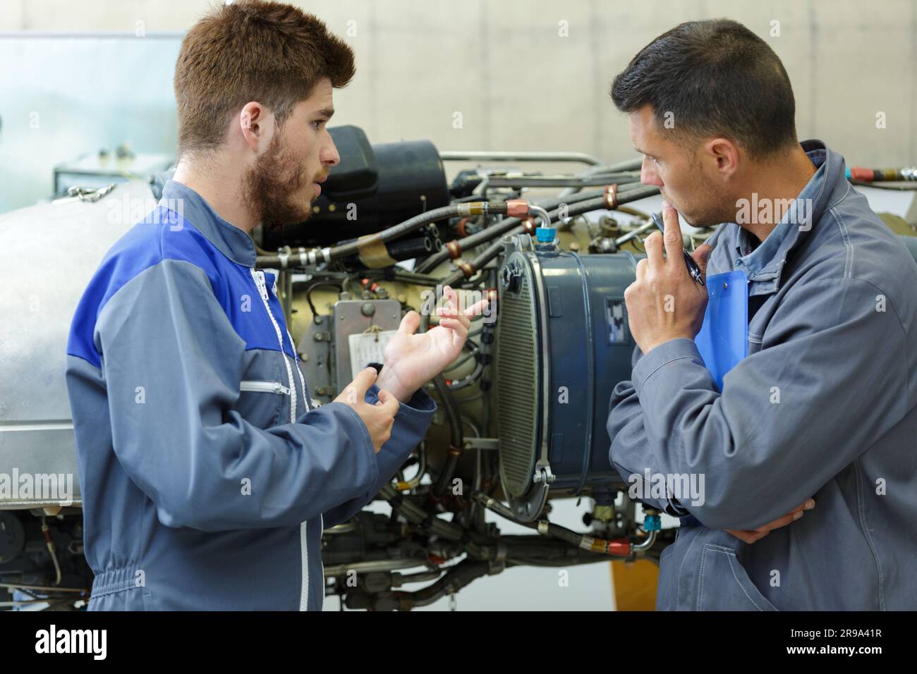 portrait of men checking the engine Stock Photo - Alamy