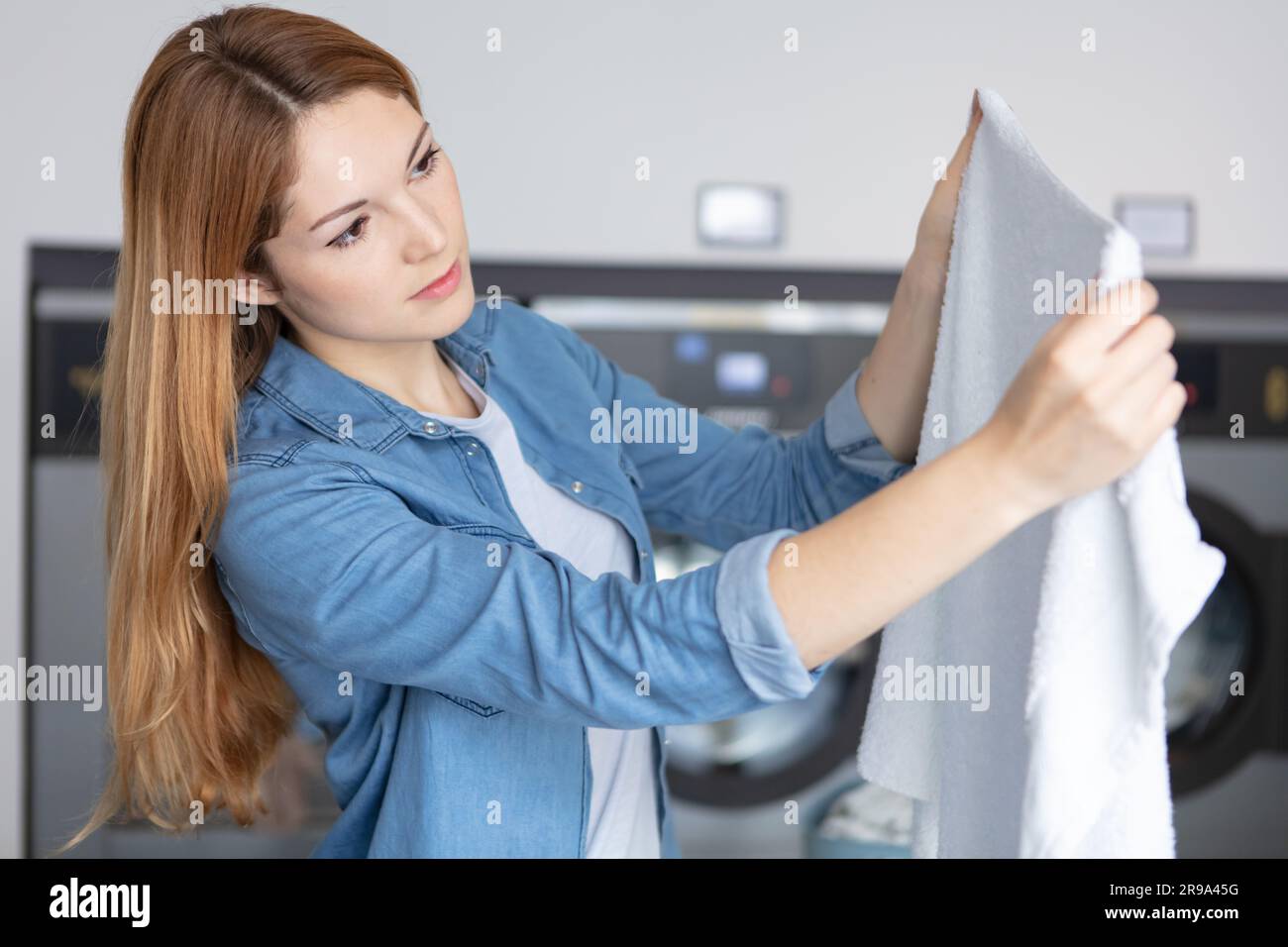 Laundry day modern woman hi-res stock photography and images - Alamy