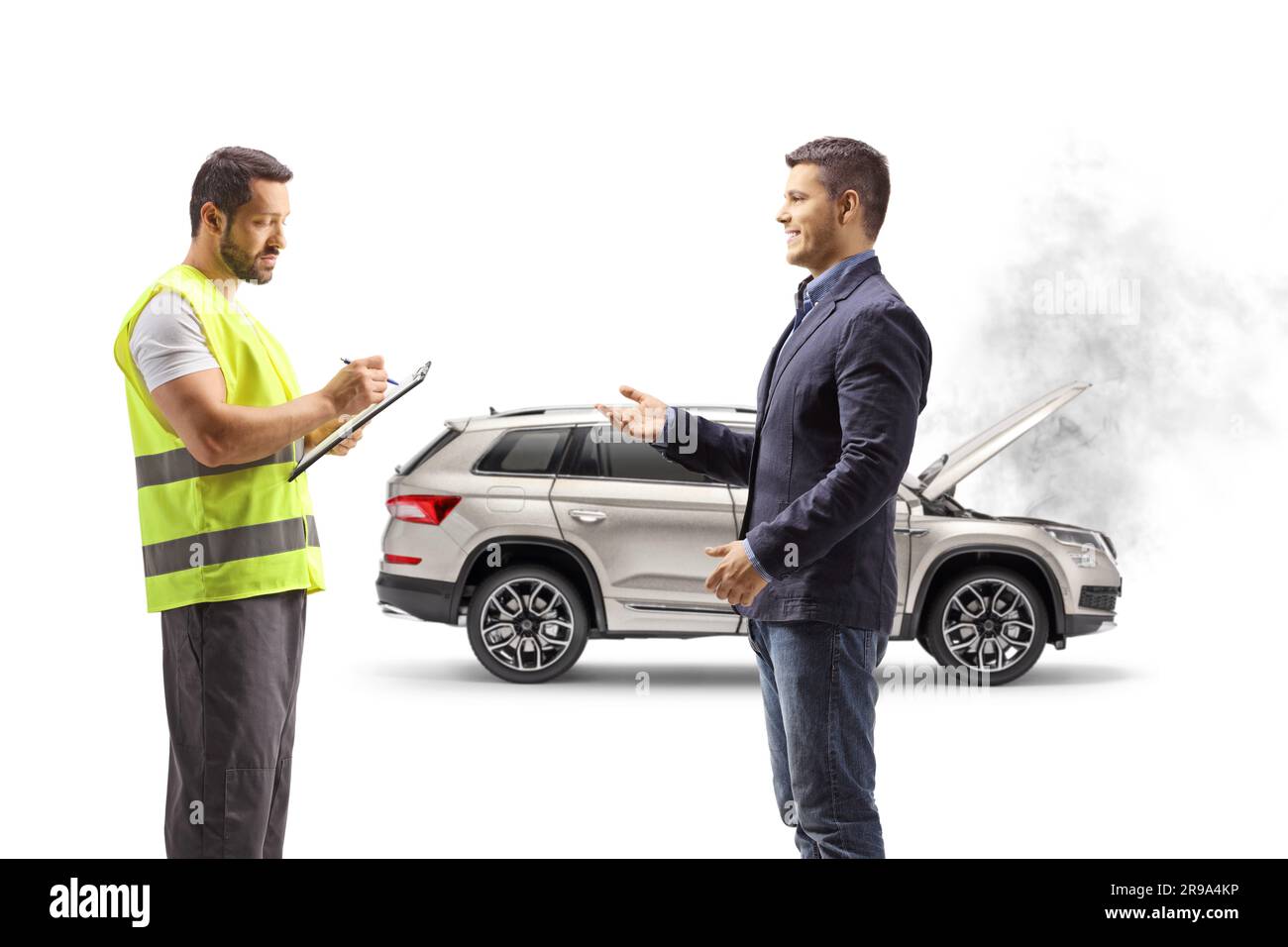 Driver explaining a car problem an a road help agent writing down a ...