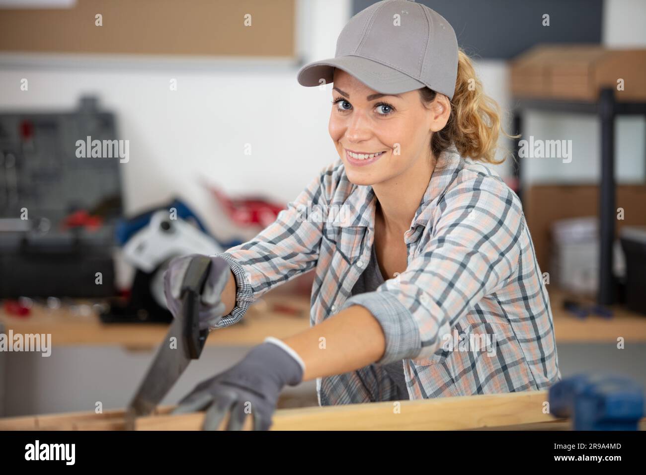 Female carpenter level tool hi-res stock photography and images - Alamy