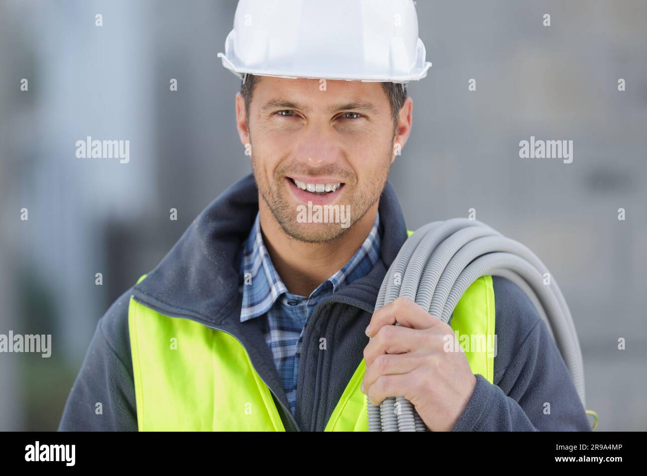 Man holding extension cord hi-res stock photography and images - Alamy