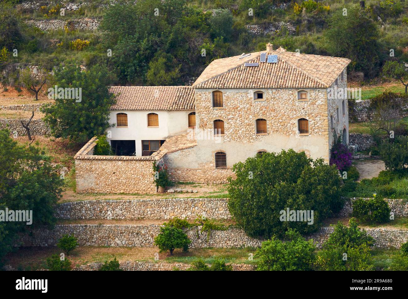 A traditional old stone mediterranean farmhouse, called masia in ...