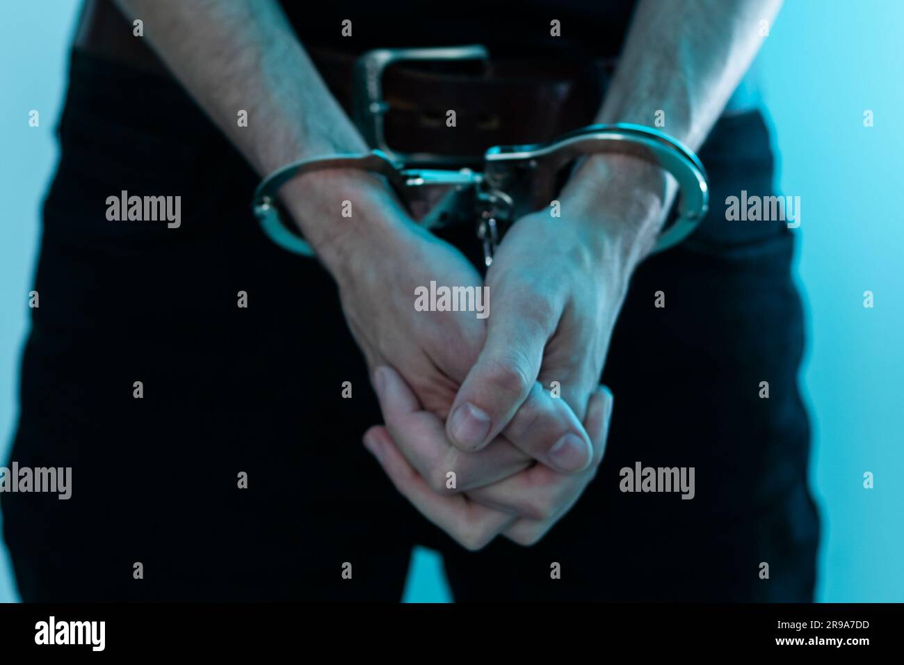 prisoner concept, Handcuffed hands of a prisoner in prison, Male ...