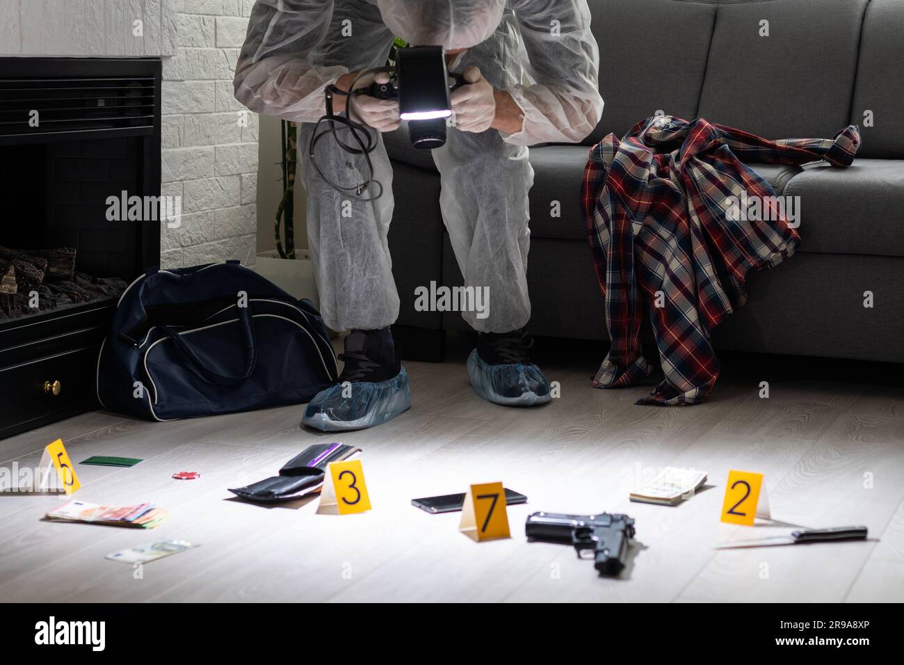 Detective Collecting Evidence in a Crime Scene. Forensic Specialists ...