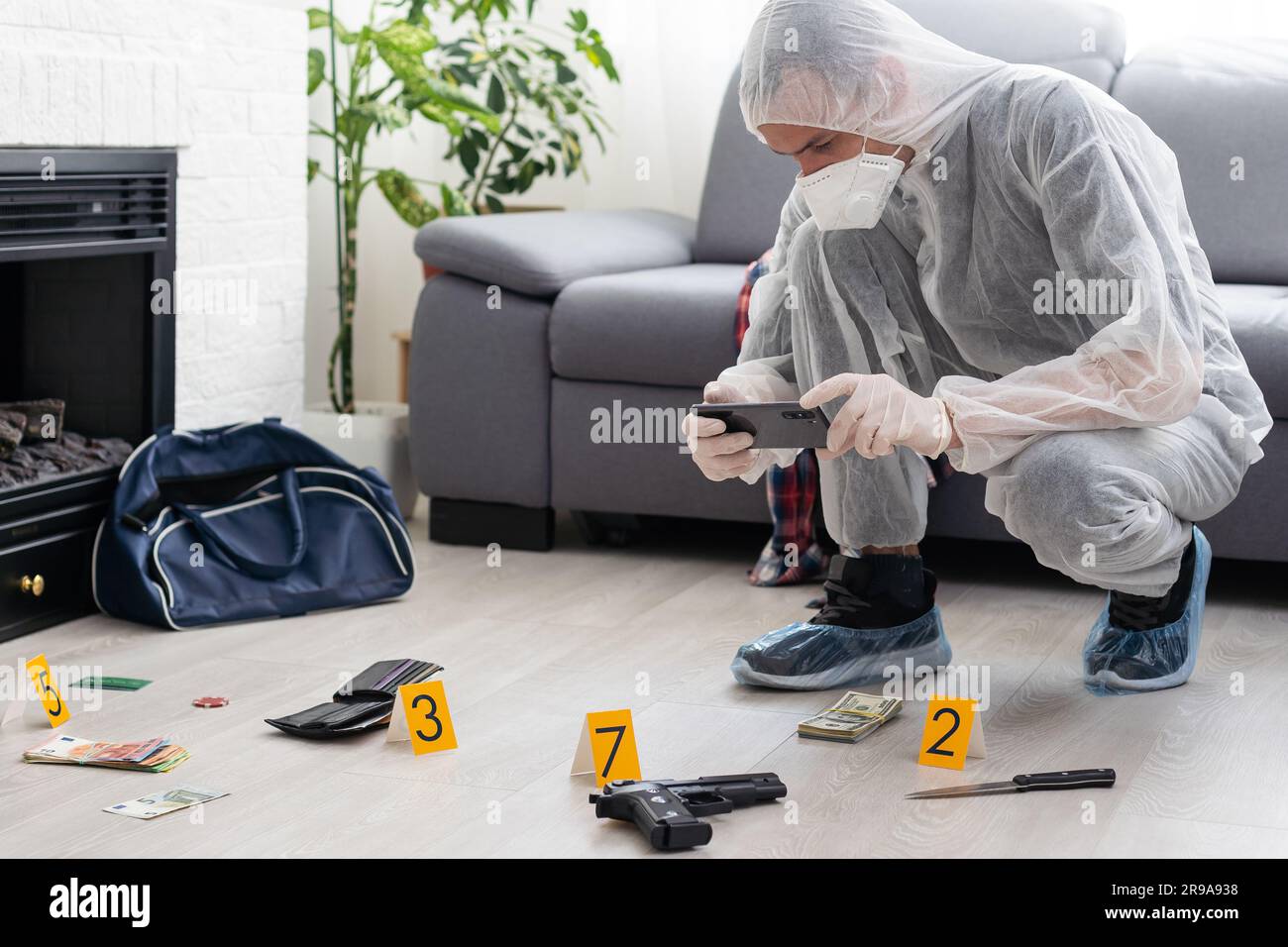 Crime scene investigation - collecting pistol and cartridges by ...