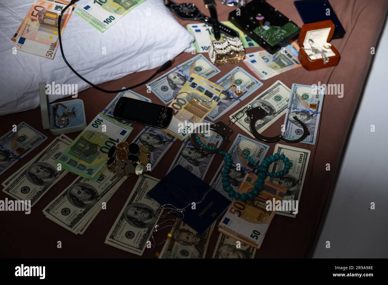 Flat lay composition with evidences and crime scene markers on ...