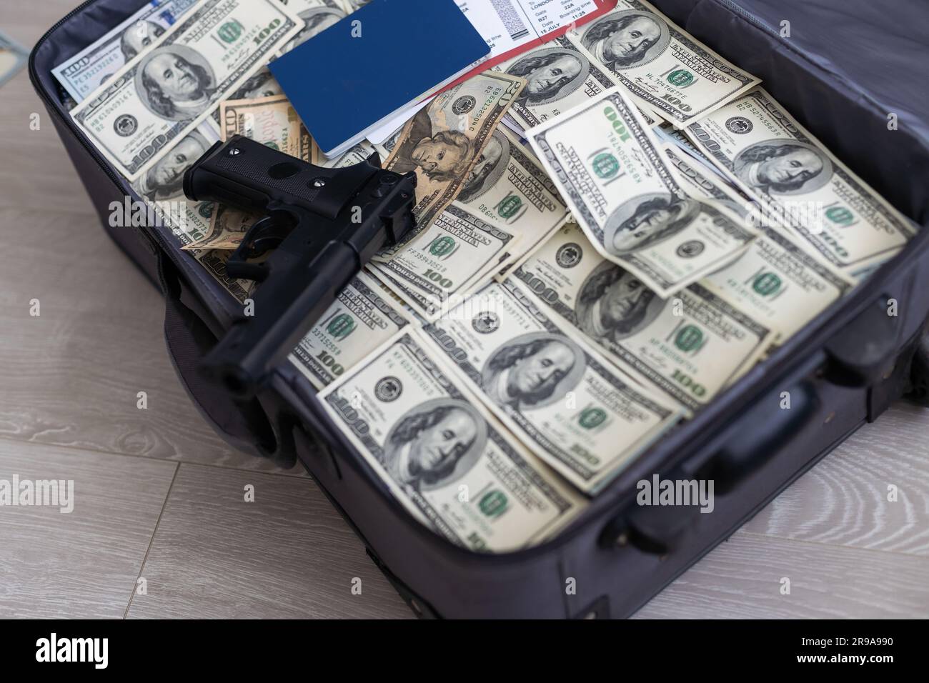 Open suitcase with one million dollars bills stacks Stock Photo - Alamy