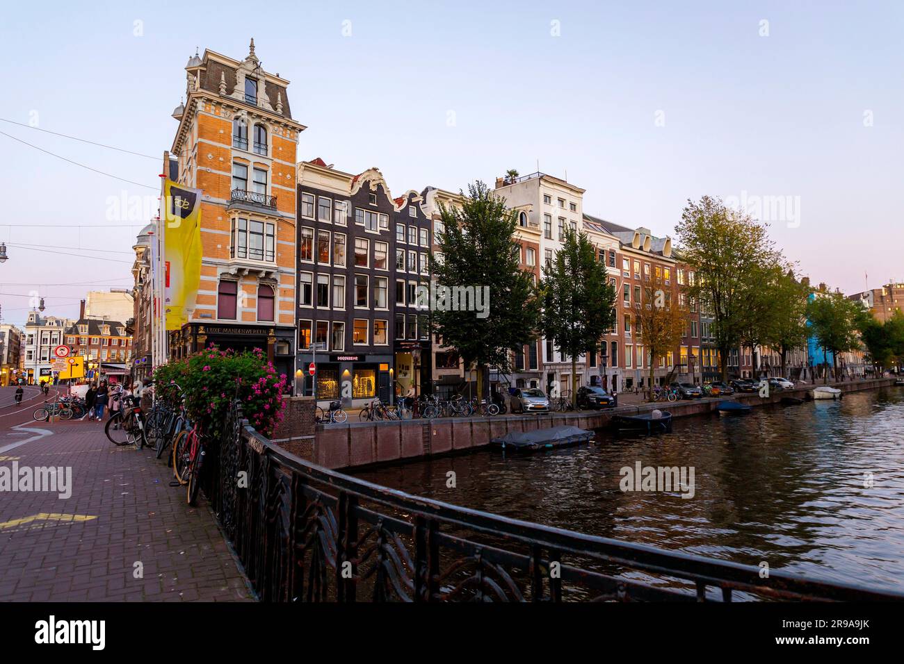 Amsterdam, NL - October 12, 2021: Canals and typical dutch architecture ...