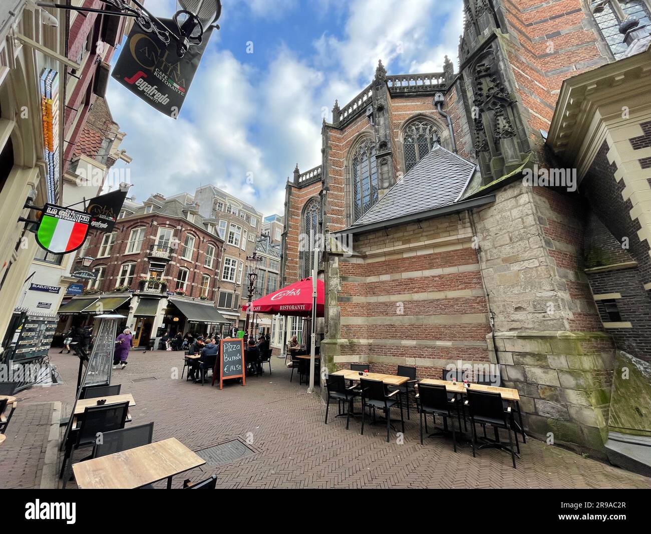 Amsterdam, the Netherlands - October 10, 2021: People eating, drinking ...